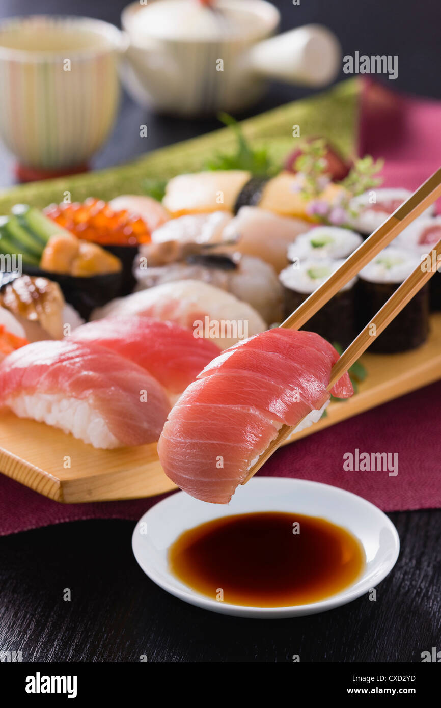 Medium Fatty Tuna Sushi Dipped into Soy Sauce Stock Photo - Alamy