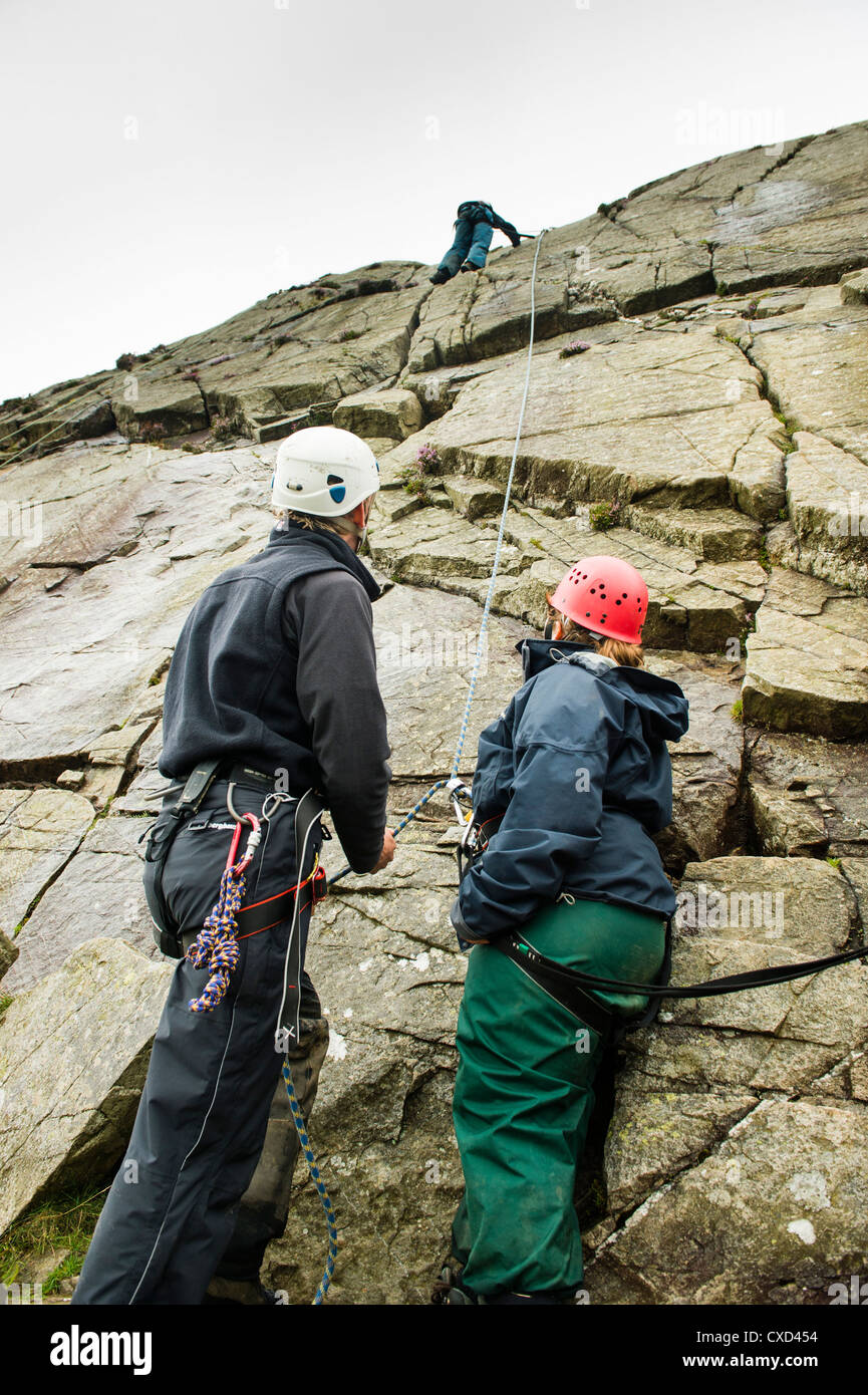 Rock Climbing in the Mawddach valley north wales: Teenagers taking part ...