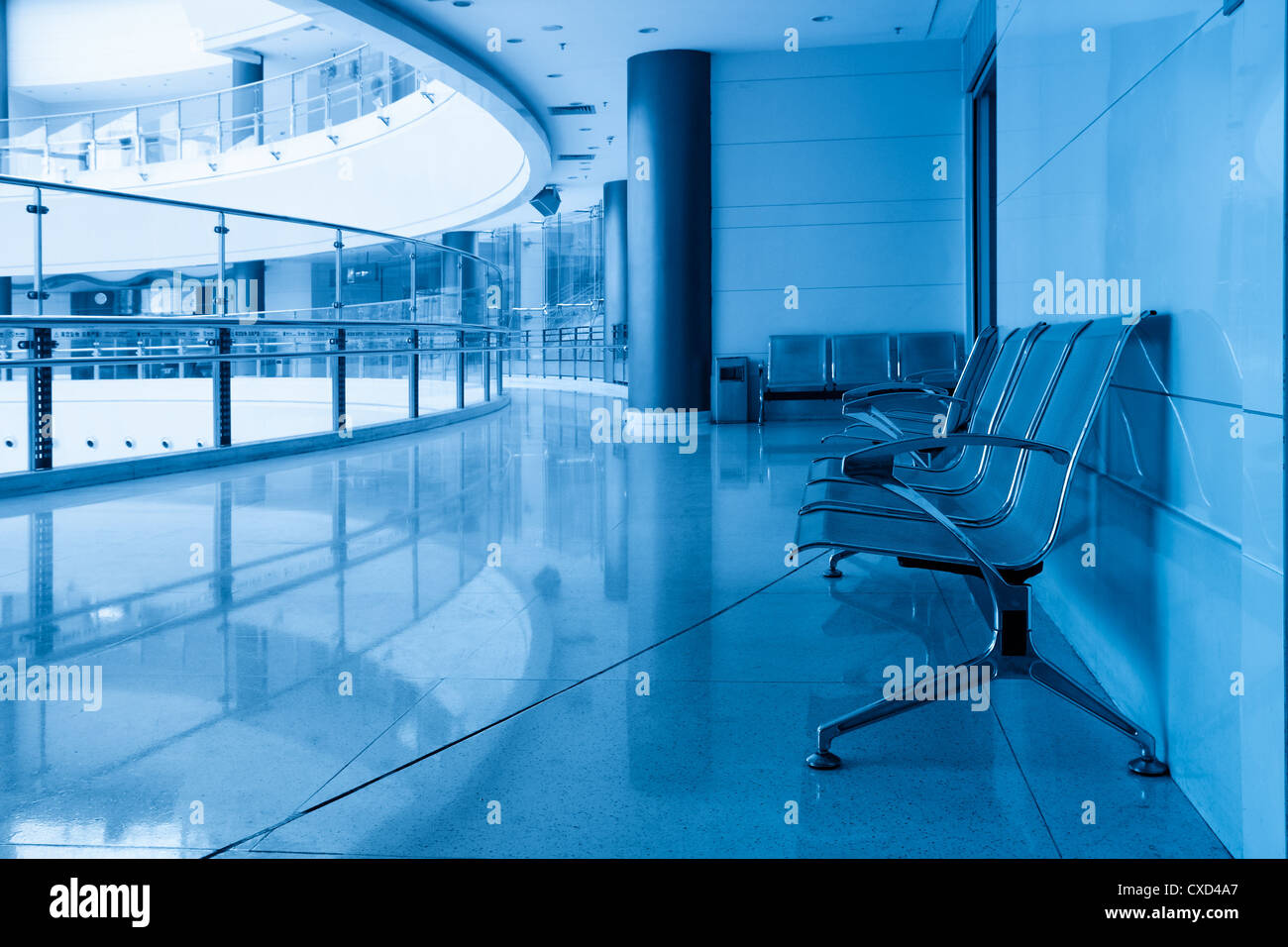 chairs and curved corridor Stock Photo - Alamy