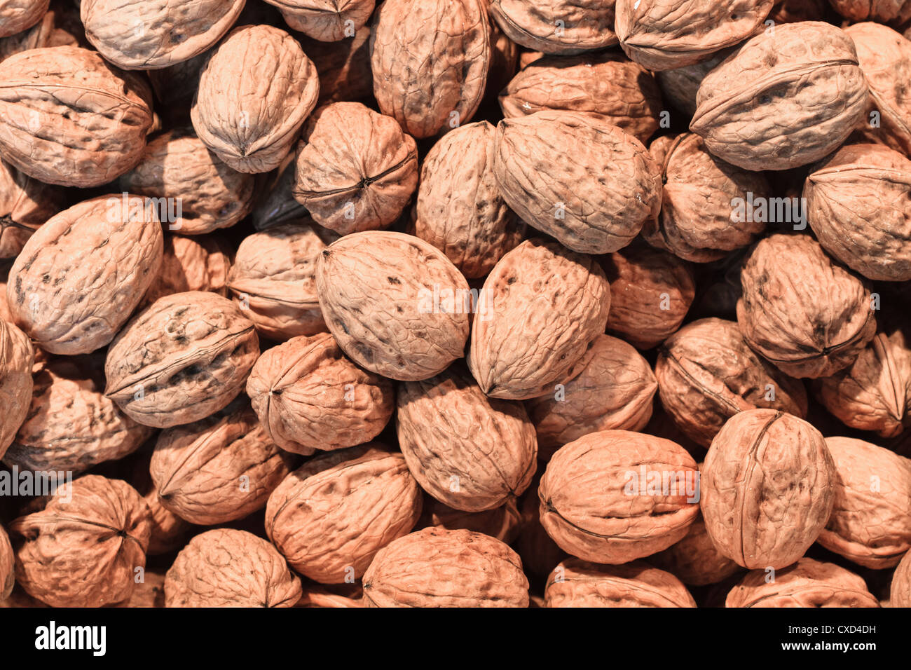 Walnuts Heap at local Market Stock Photo - Alamy