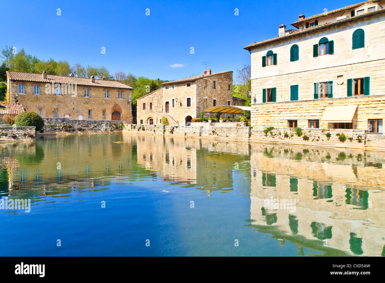 Old thermal baths in the medieval village Bagno Vignoni, Tuscany, Italy ...
