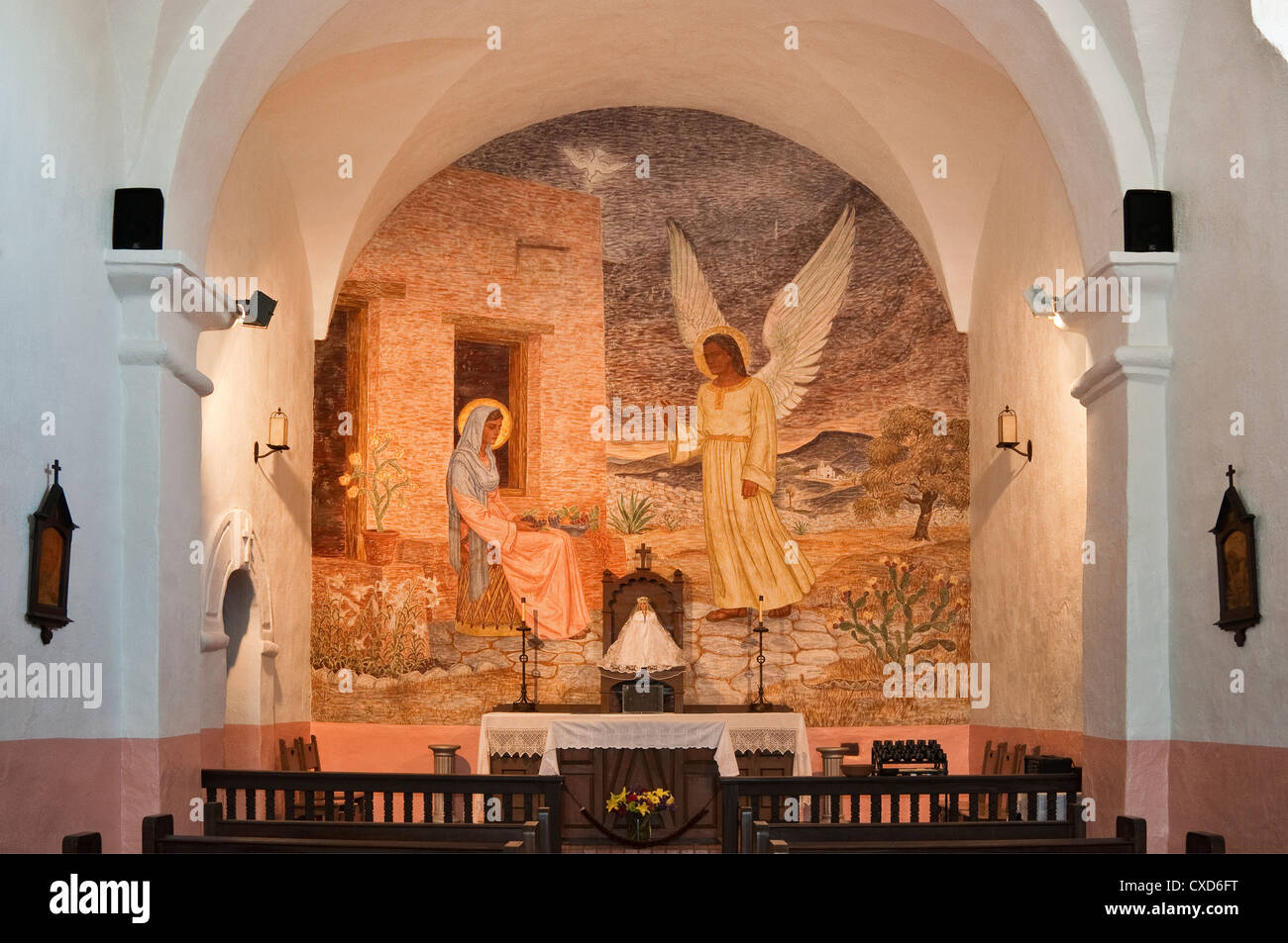 Illuminated Annunciation fresco by Antonio Garcia behind altar at Our ...