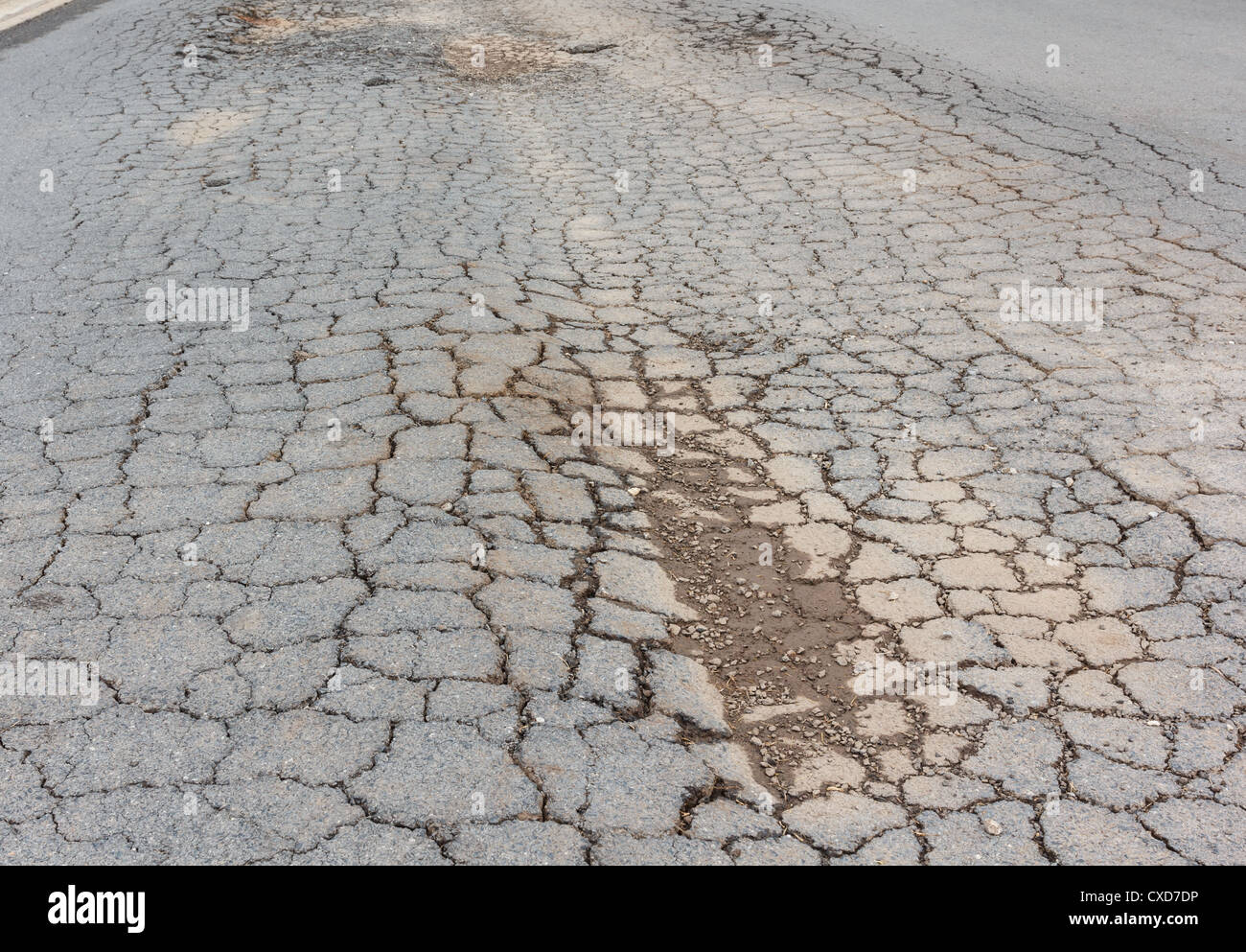 Cracked asphalt road Stock Photo - Alamy