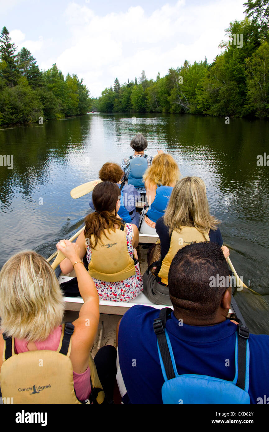 Canoe tour along the Akiawenrahk (Saint-Charles) River which threads ...