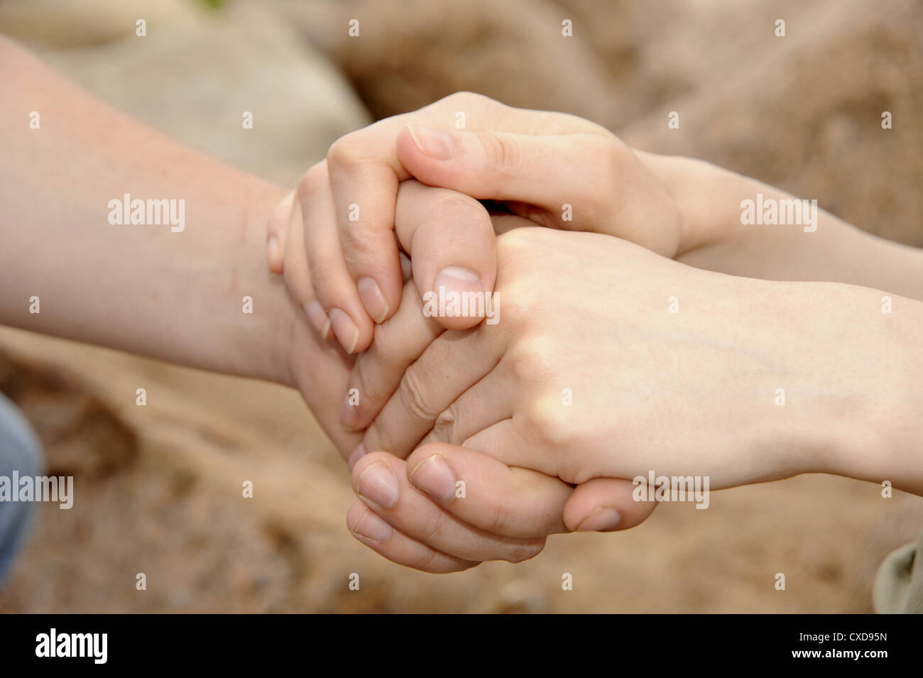 Man's and female hands are fastened together.Taken as closeup Stock ...