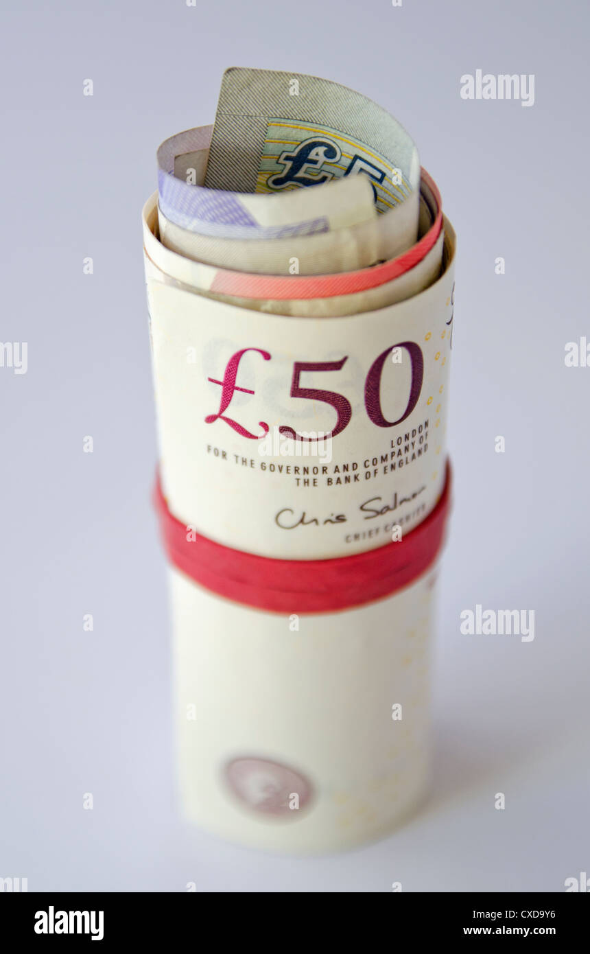 Roll fifty pound notes hi-res stock photography and images - Alamy
