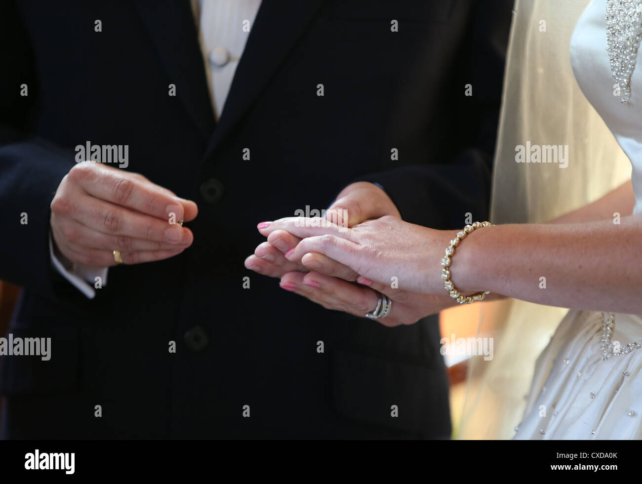 Wedding Rings are exchanged during a wedding ceremony in a church Stock ...