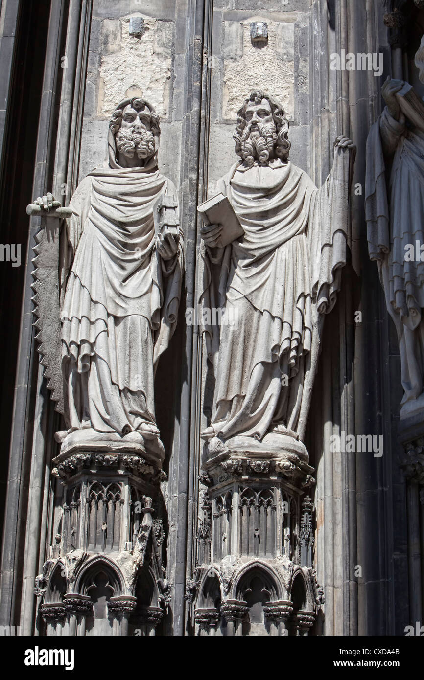 Limestone figures of an Apostle on the main portal, west façade ...