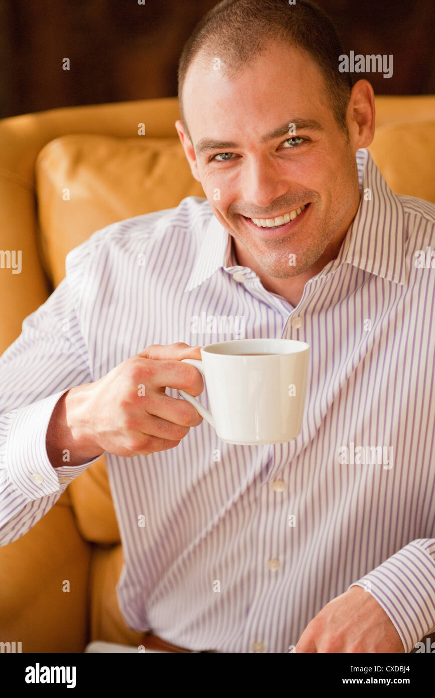 Caucasian man drinking coffee Stock Photo - Alamy Caucasian man drinking coffee Stock Photo - Alamy