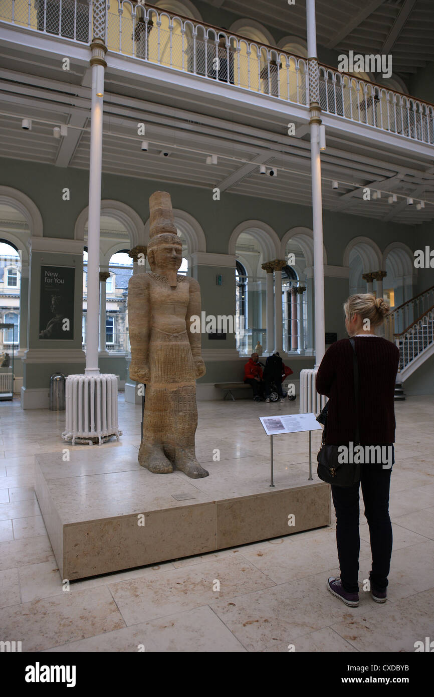 Visitor looking at an exhibit in the National Museum of Scotland in ...