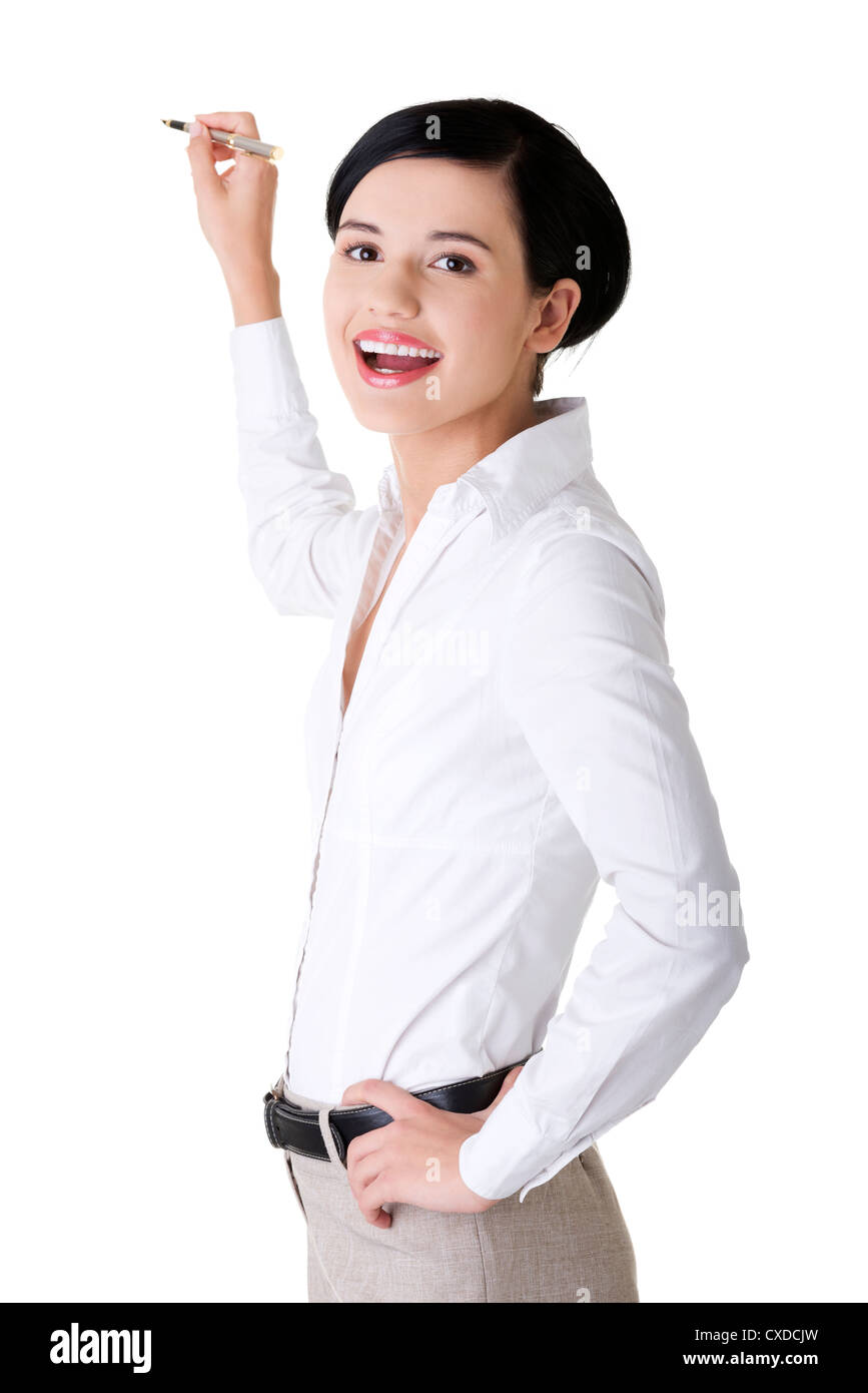 Young beautiful student woman writing with a pen on abstract screen ...