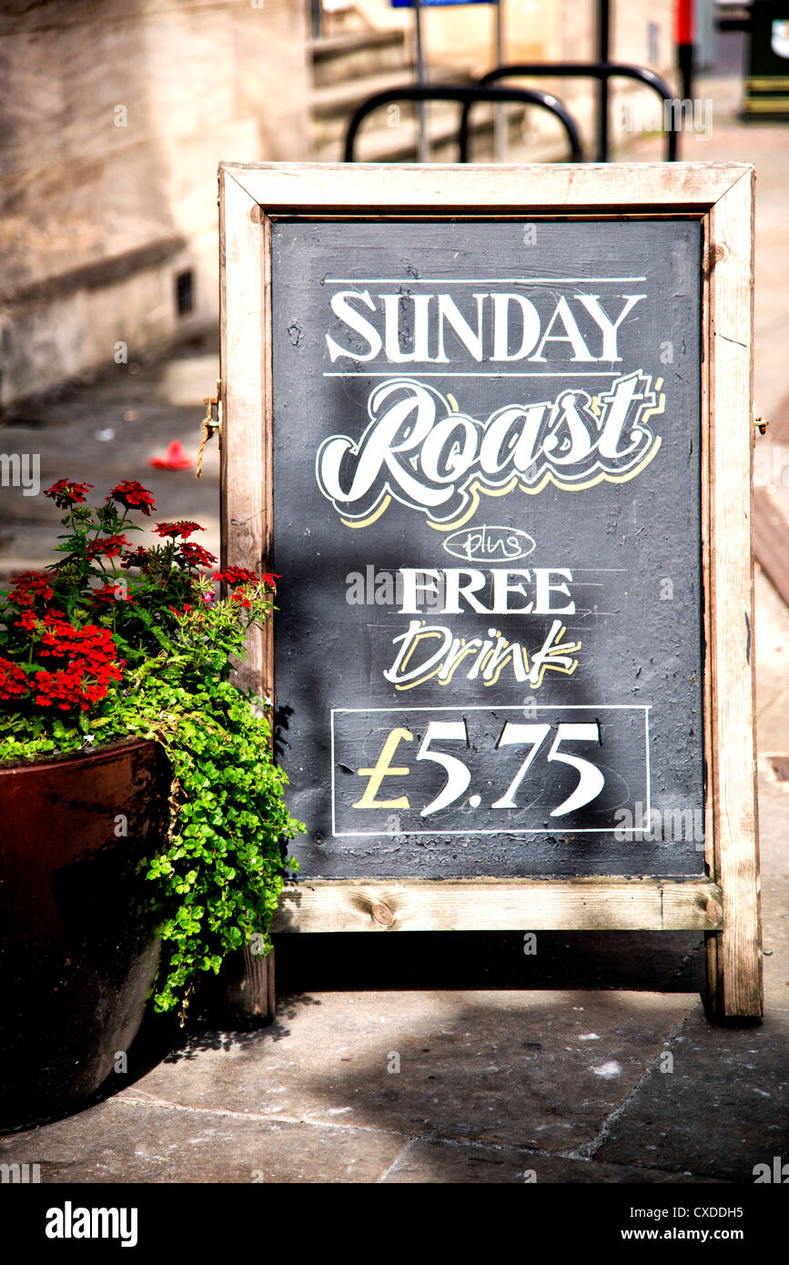 Menu outside a restaurant with advertisement for Stock Photo - Alamy