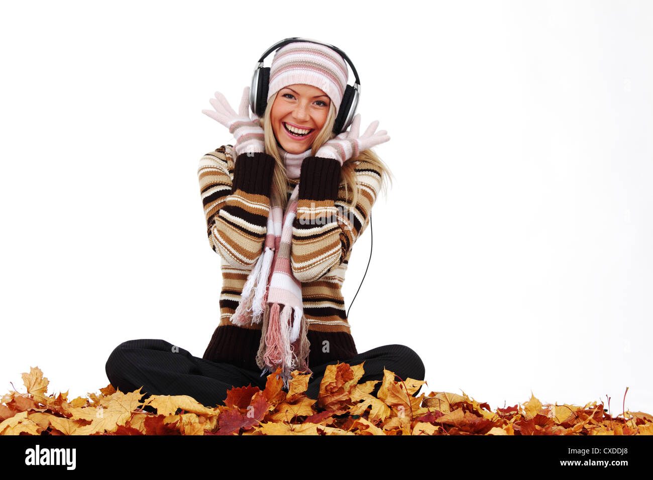 autumn woman listening music in studio Stock Photo - Alamy