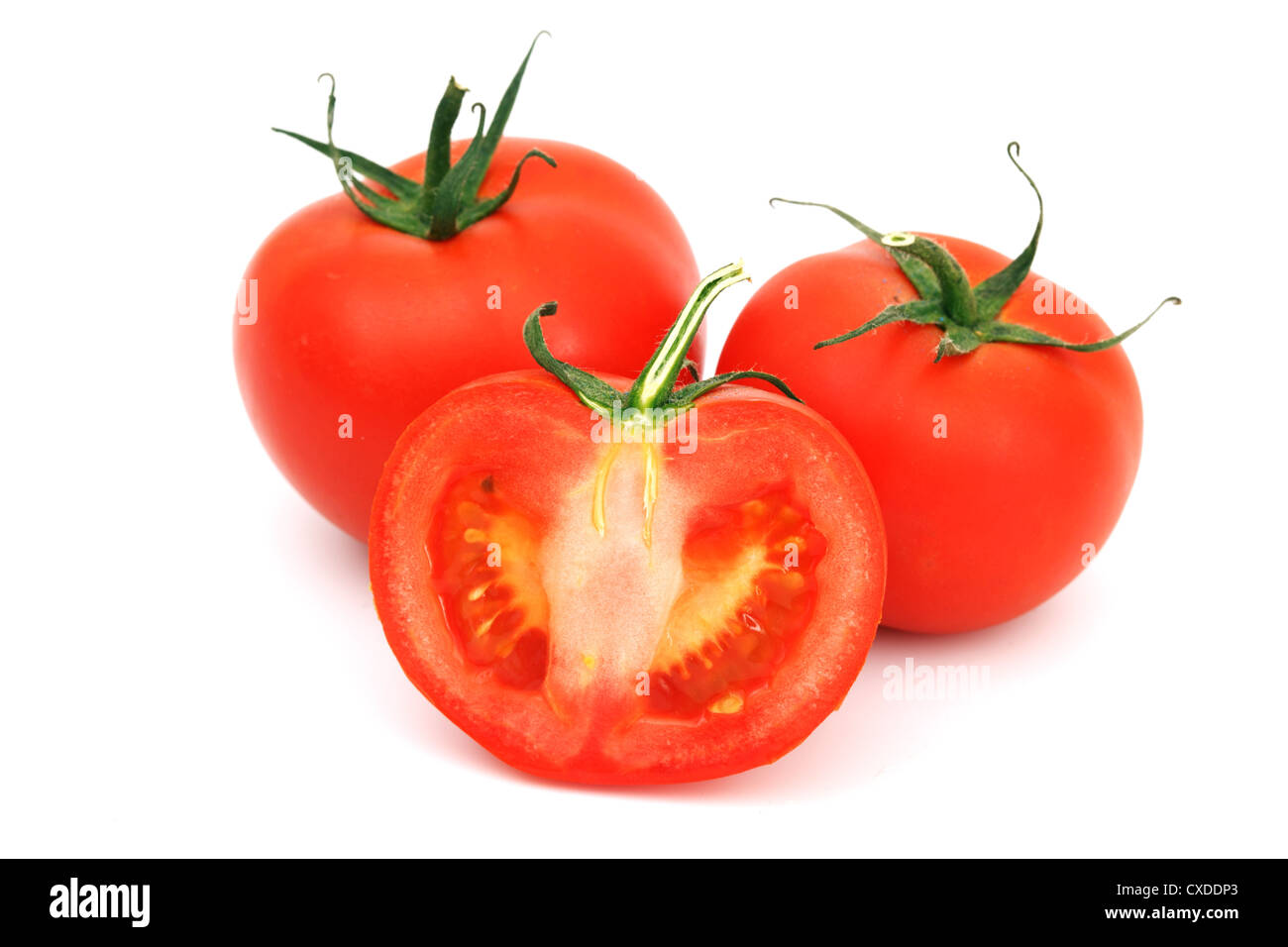 tomato pile slice isolated on white Stock Photo - Alamy
