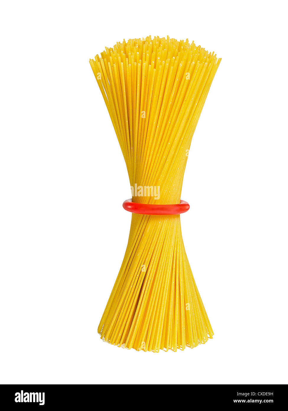 Spaghetti standing on white in a decorative way Stock Photo - Alamy