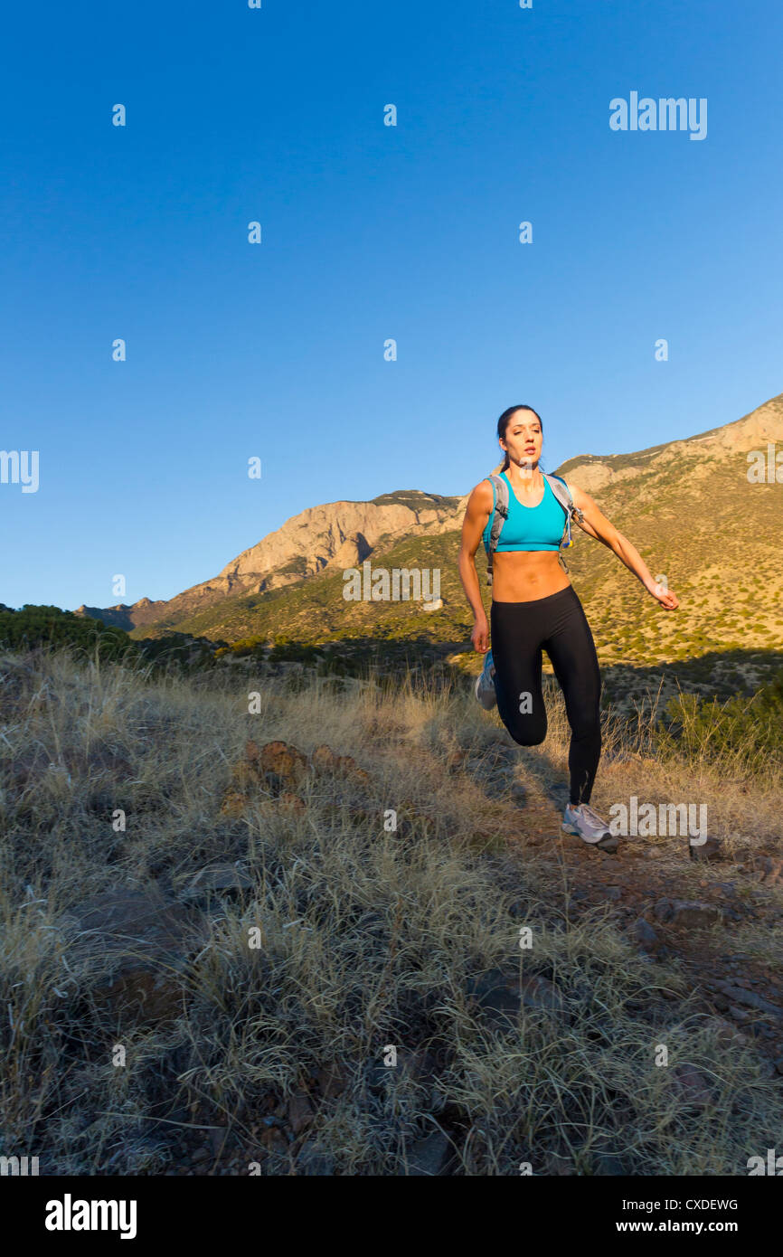 Woman running on mountain hi-res stock photography and images - Alamy
