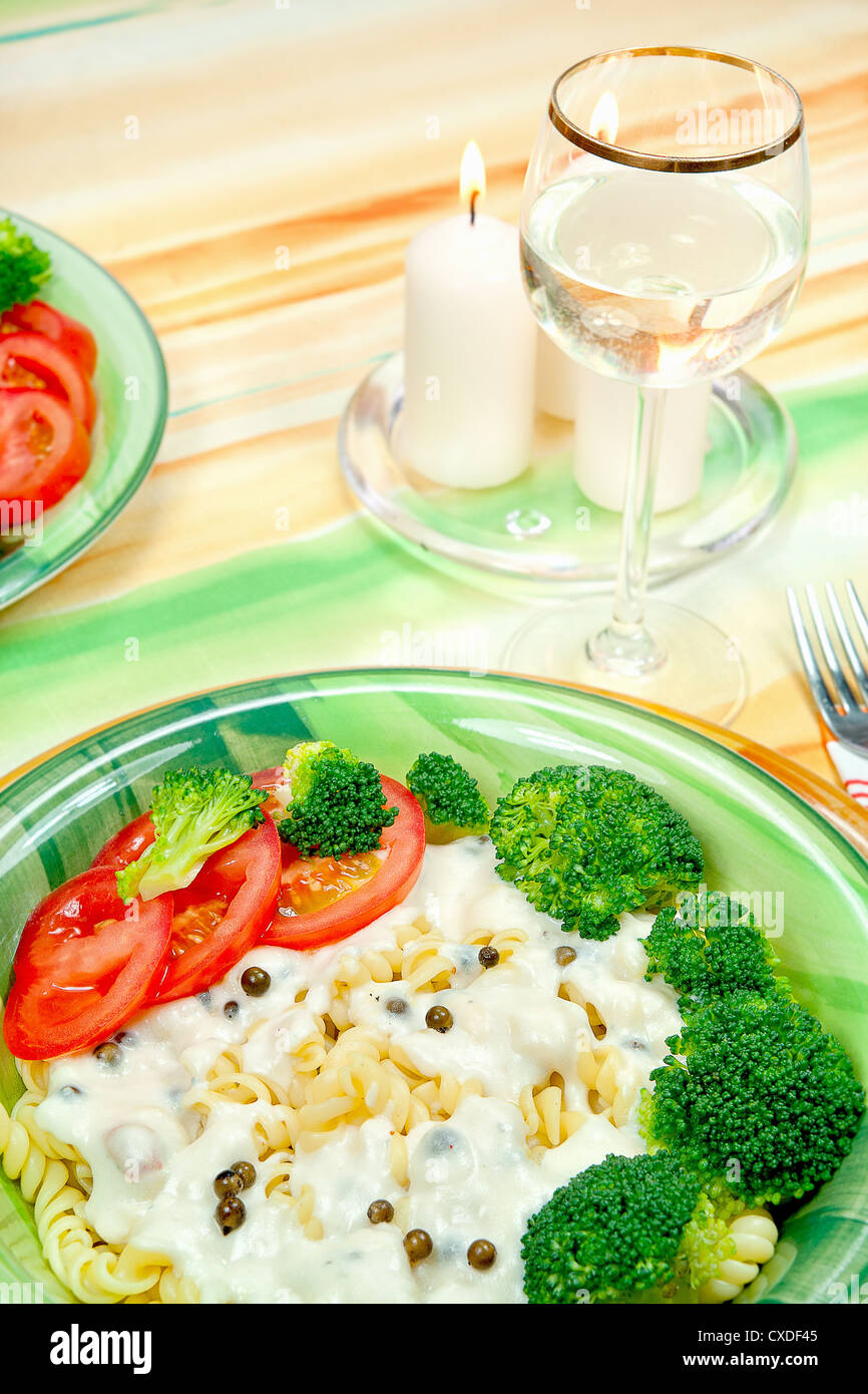 fresh hot spaghetti with cheese sauce with broccoli Stock Photo - Alamy