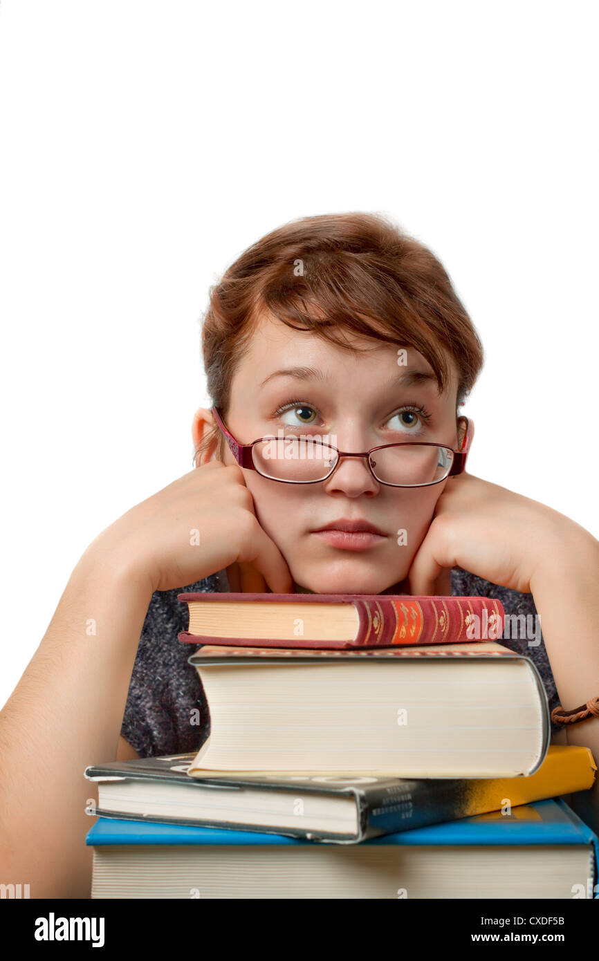 Photo of young girl studying with books Stock Photo - Alamy