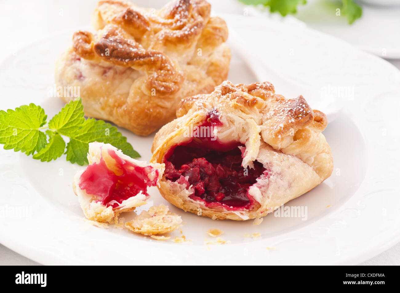 Pastry with raspberry filling Stock Photo - Alamy
