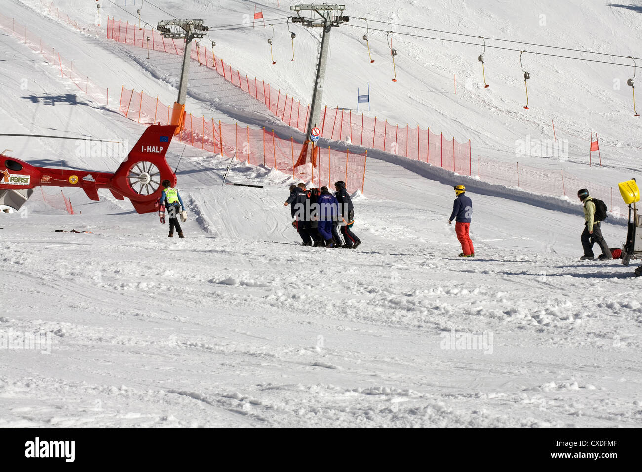 seriuosly injured skier receiving treatment first aid, before being ...