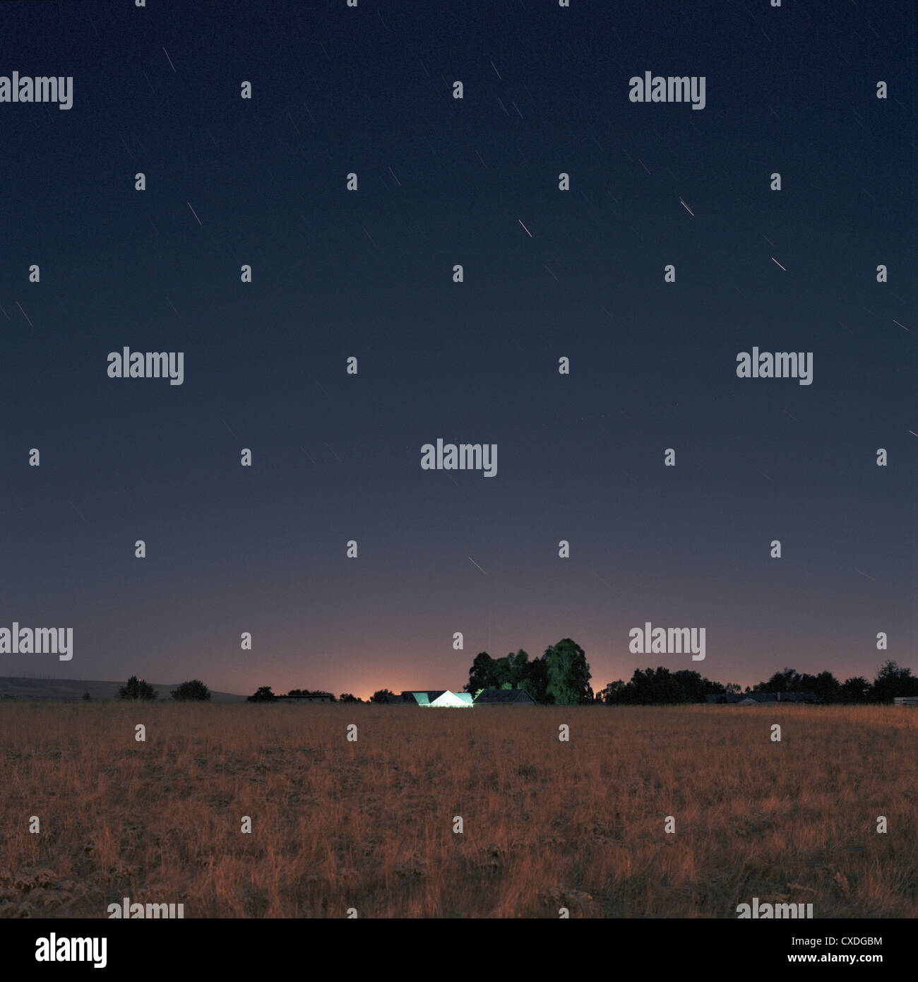 Stars and sunset over field Stock Photo - Alamy