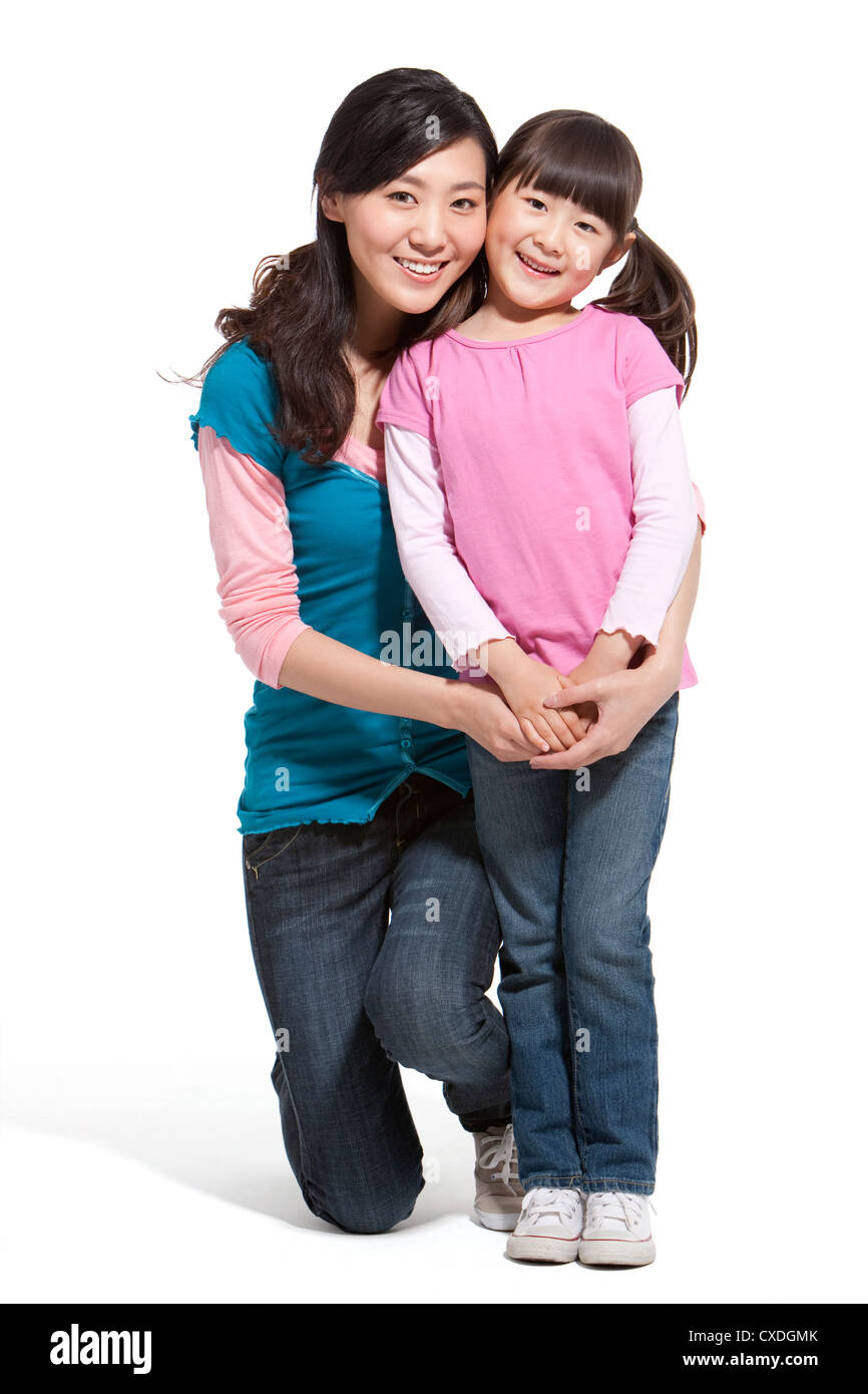 Portrait of smiling mother and daughter Stock Photo - Alamy