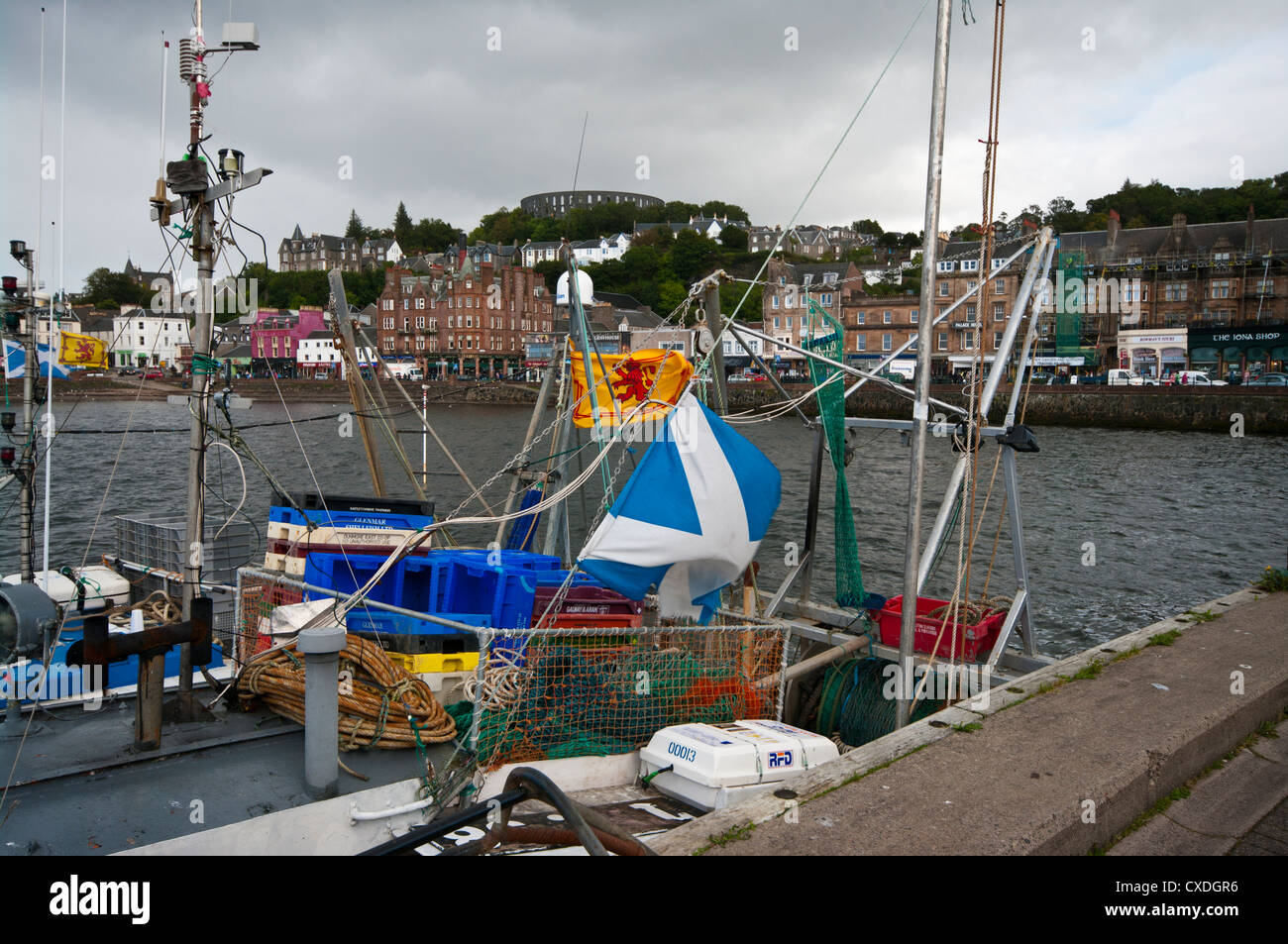 Scottish Flag Flags On Fishing Boats With The Town of Oban Argyll and ...
