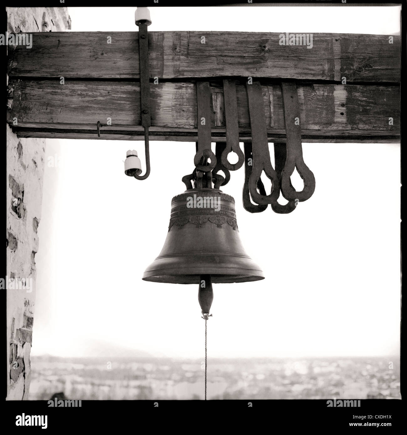 Bell hanging from wooden beam hi-res stock photography and images - Alamy