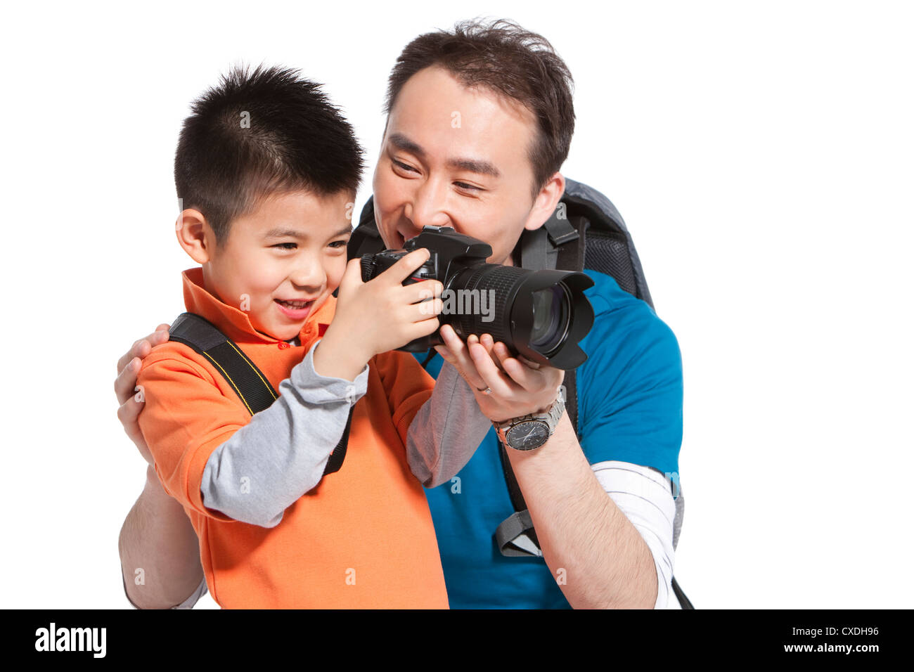 Happy father and son with a camera Stock Photo - Alamy