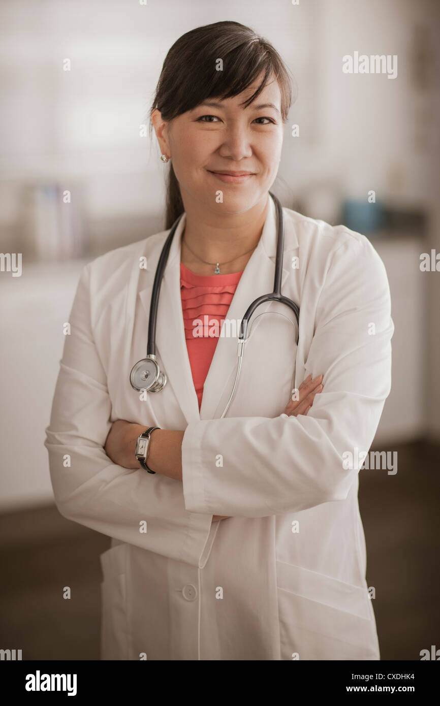 Smiling Chinese doctor Stock Photo - Alamy