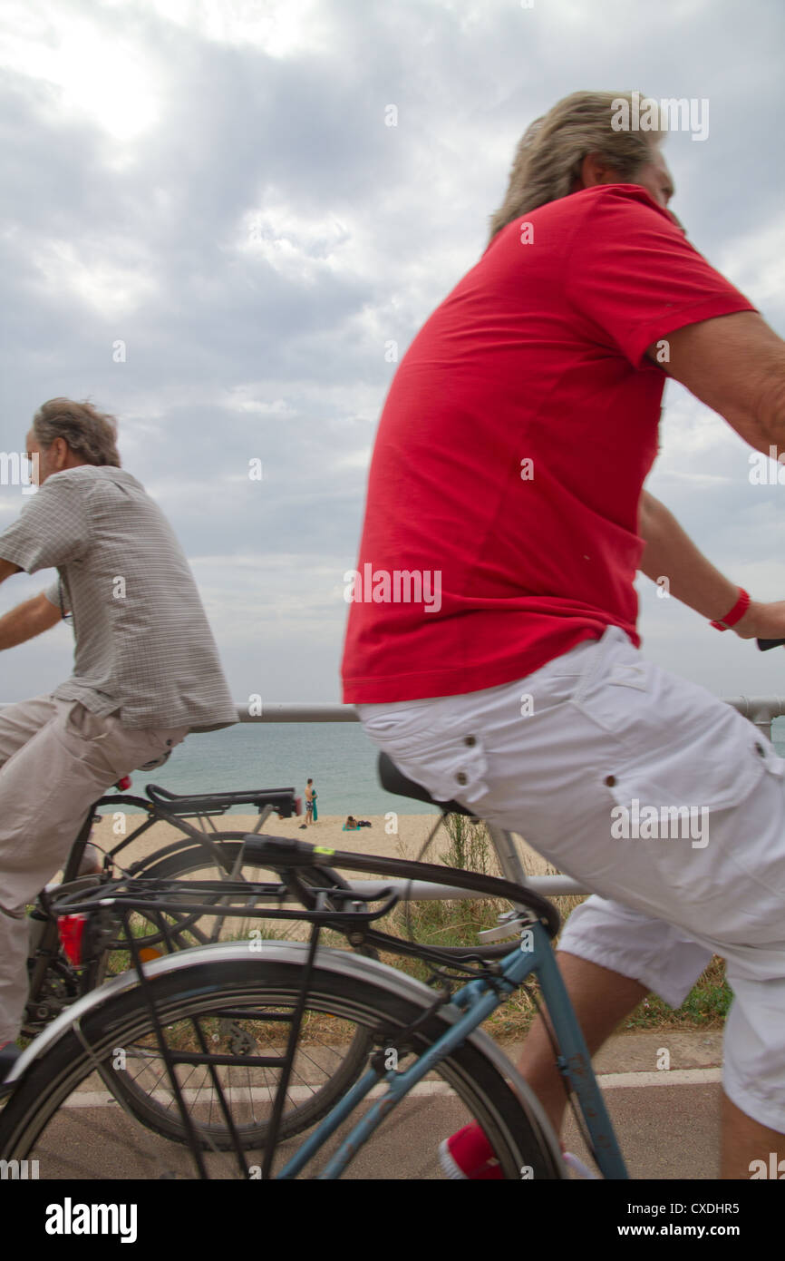 cyclists Riding bikes on path, person cycling on bicycle path on ...