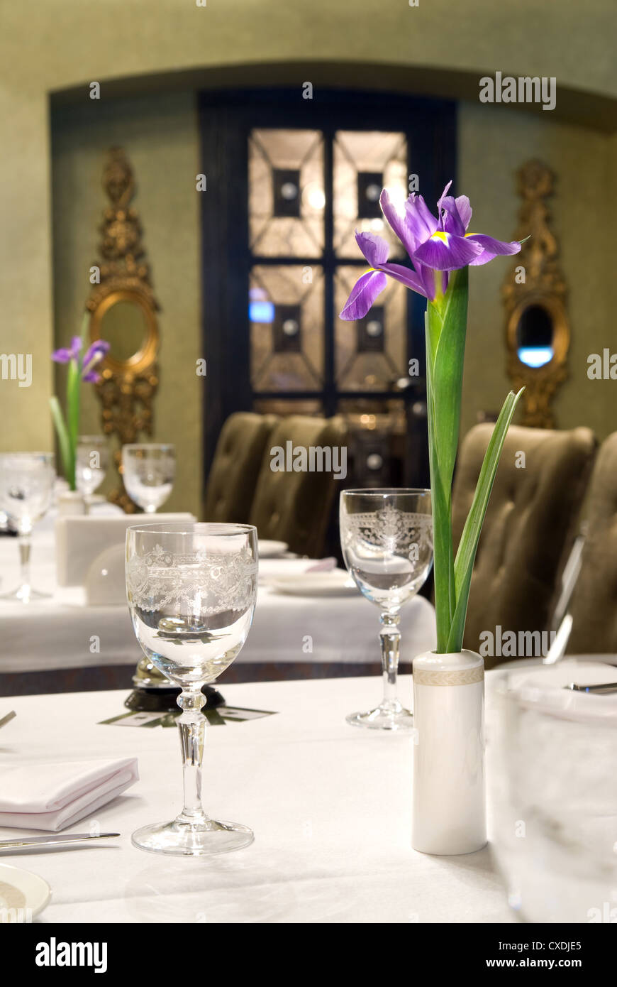 served table in restaurant with flower Stock Photo - Alamy