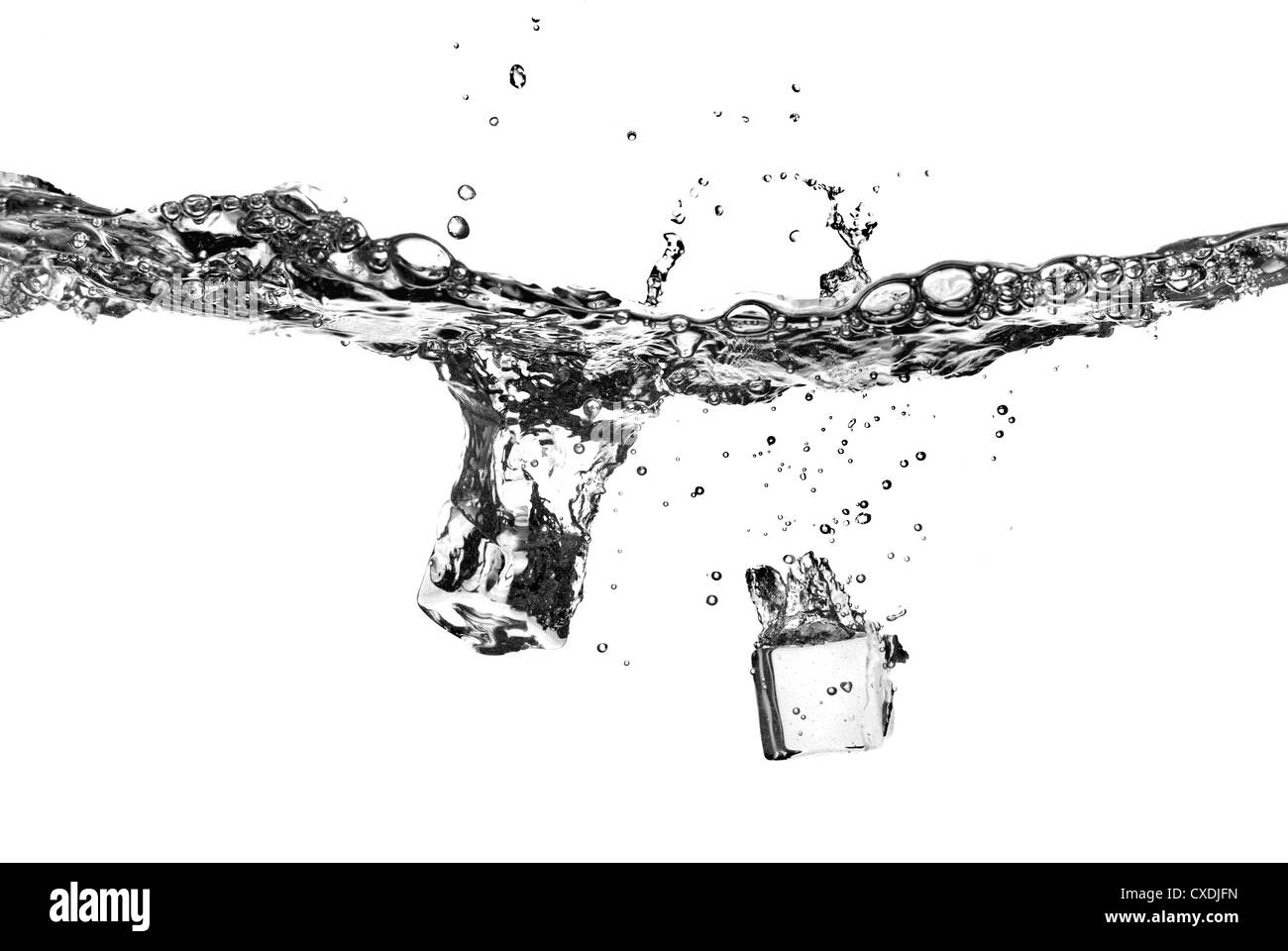 ice cubes dropped into water with splash isolated on white Stock Photo - Alamy