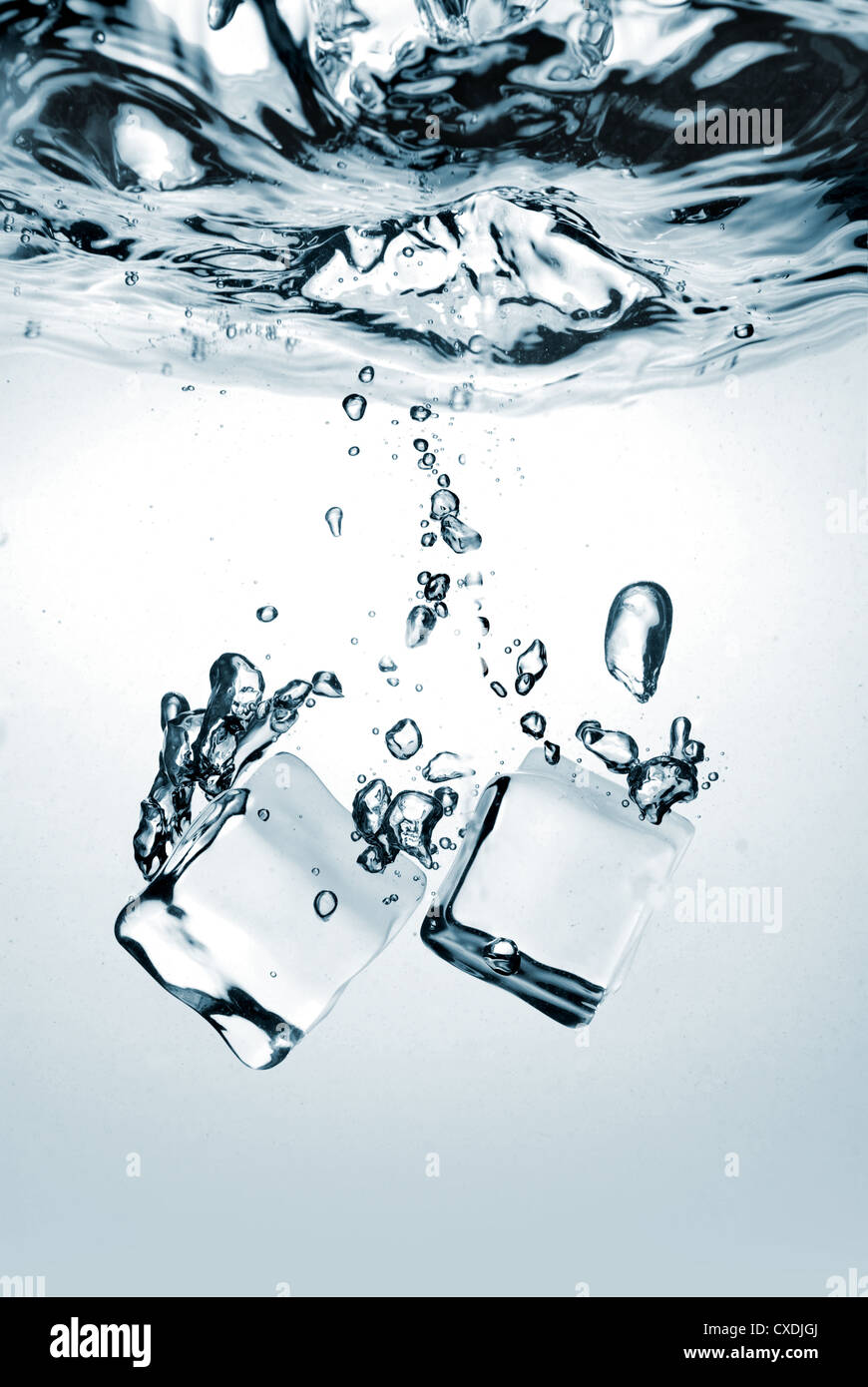ice cubes dropped into water with splash Stock Photo - Alamy