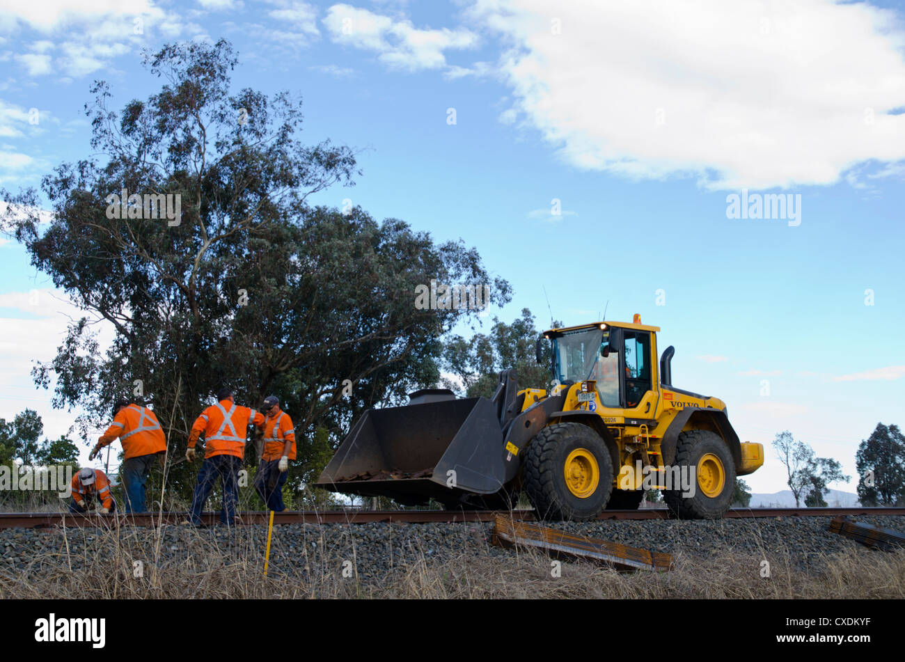 Workers removing old sleeper fasteners Stock Photo - Alamy
