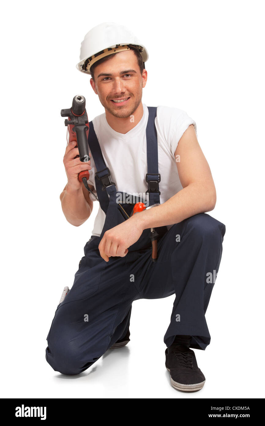 Portrait of happy young handyman with tool Stock Photo - Alamy