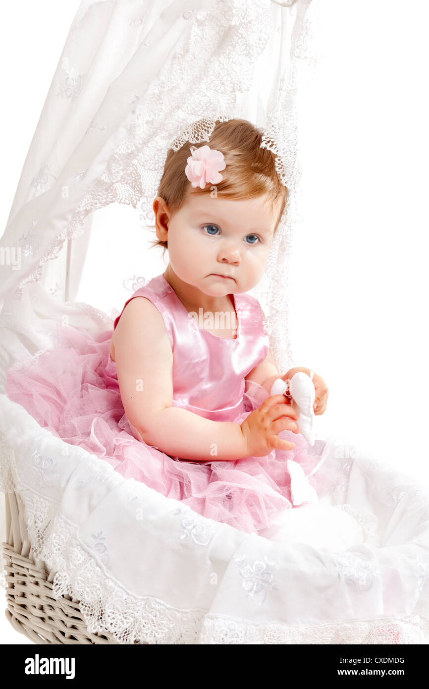 Cute little girl sitting in baby buggy Stock Photo - Alamy
