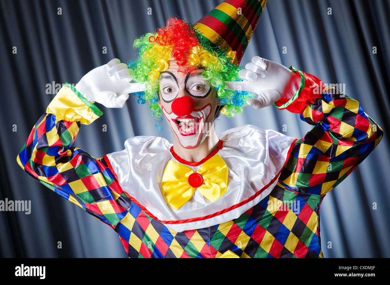 Funny clown in studio shooting Stock Photo - Alamy