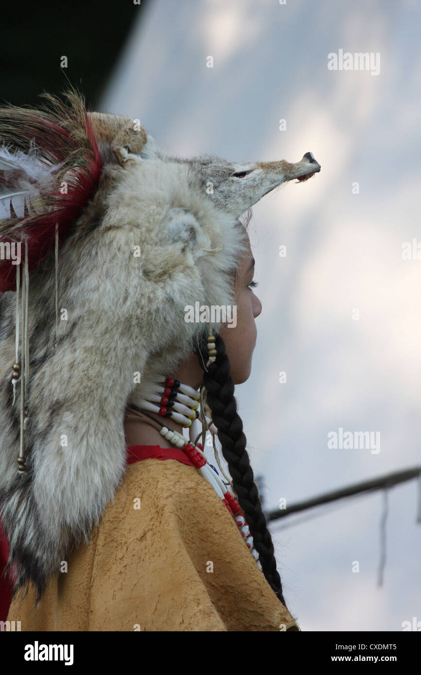 A young Native American Indian boy wearing traditional leather dress ...