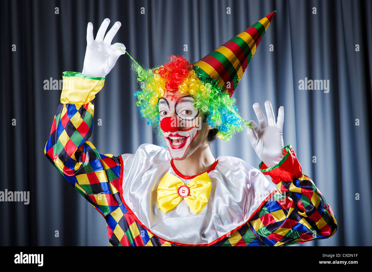 Funny clown in studio shooting Stock Photo - Alamy
