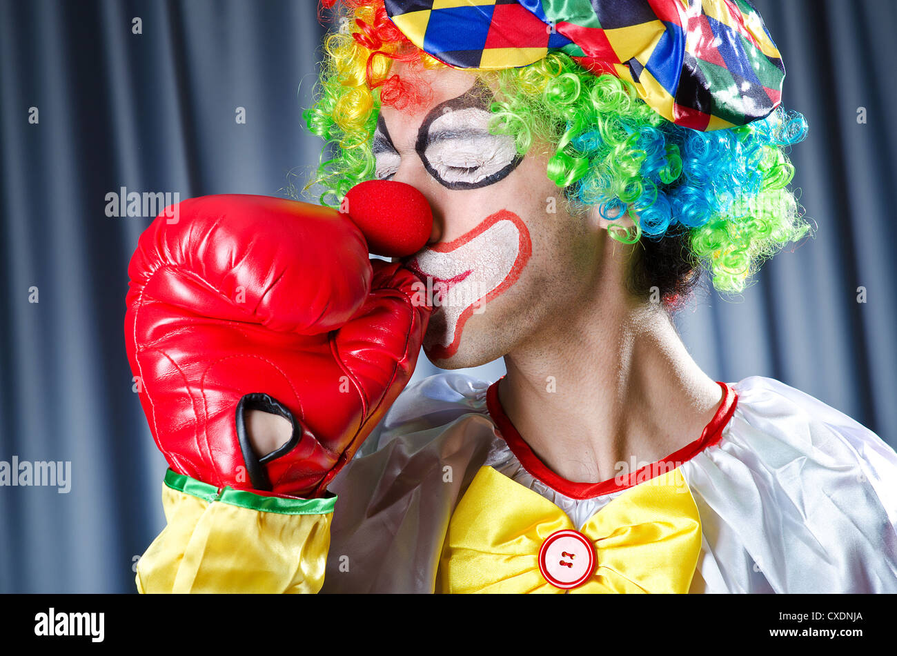 Clown with boxing gloves Stock Photo - Alamy