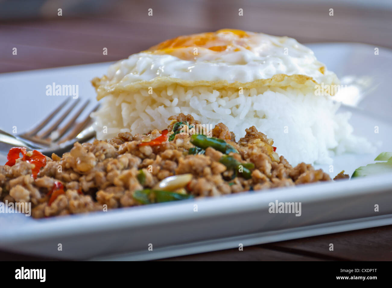 Pad Krapow Moo, spicy stir-fried pork with fried egg and Thai holy ...