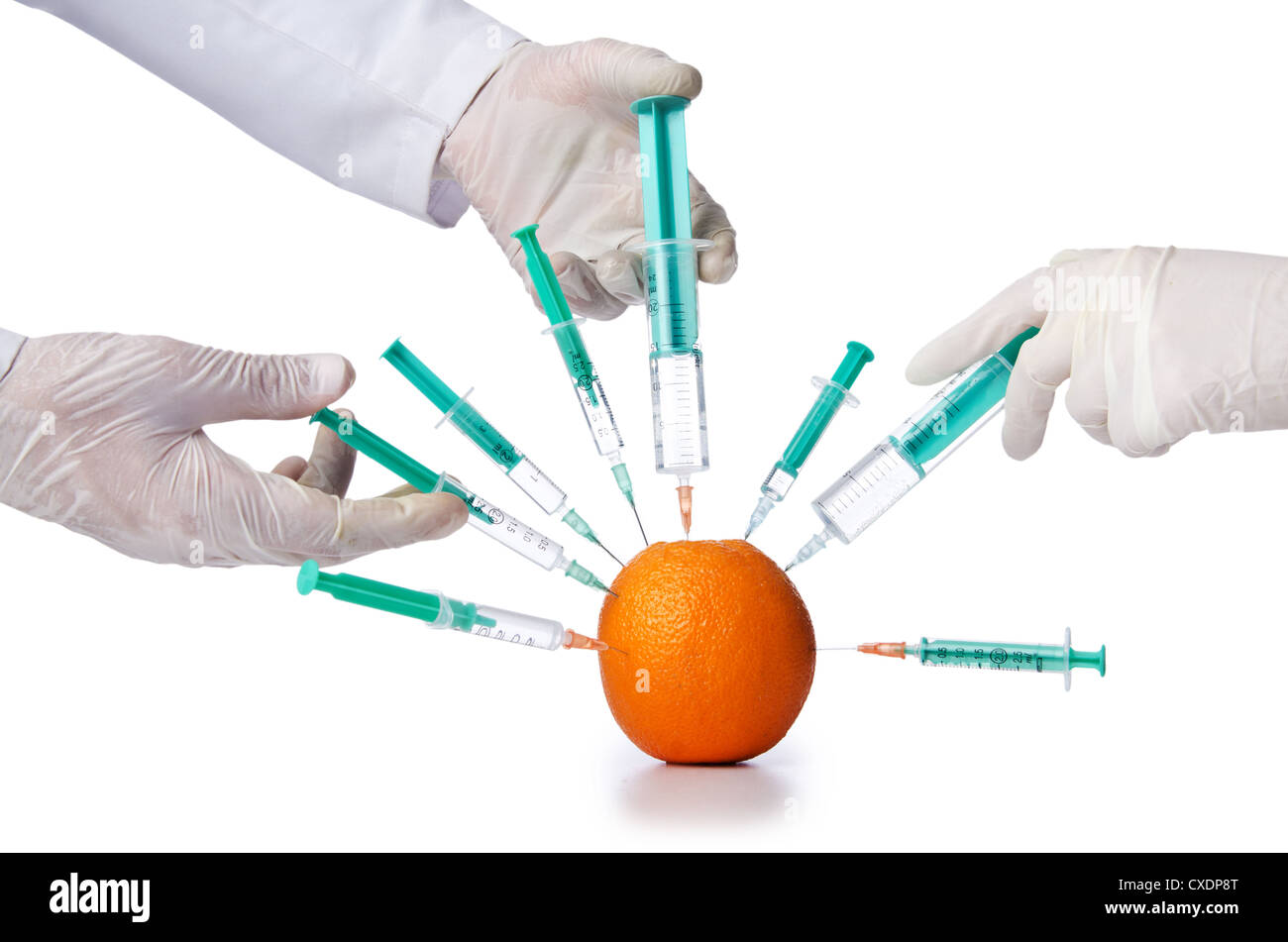 Science experiment with orange and syringe Stock Photo - Alamy