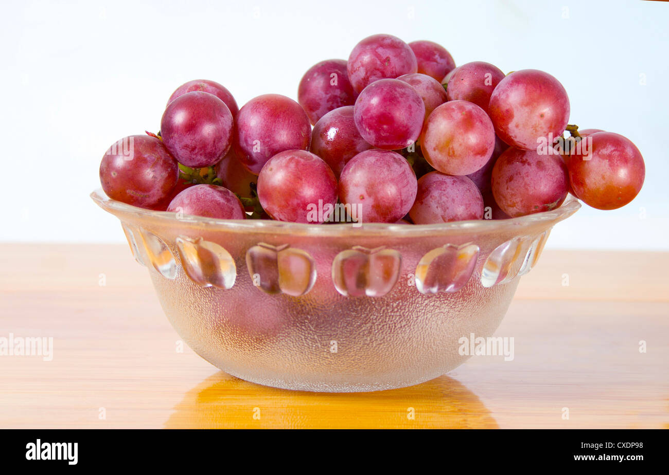 A cluster of grape grapes in glass bowl Stock Photo - Alamy