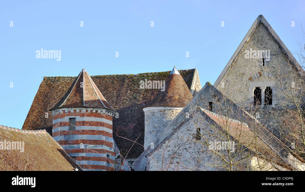 roofs of various medieval buildings with l turrets Stock Photo - Alamy