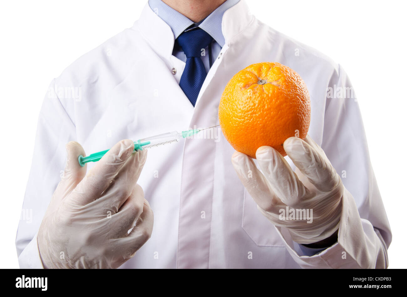 Science experiment with orange and syringe Stock Photo - Alamy