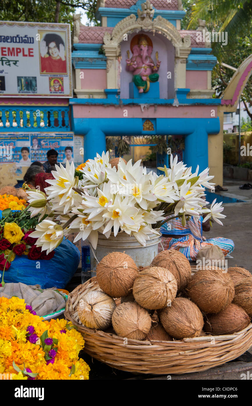 Flower offerings at temple hi-res stock photography and images - Alamy