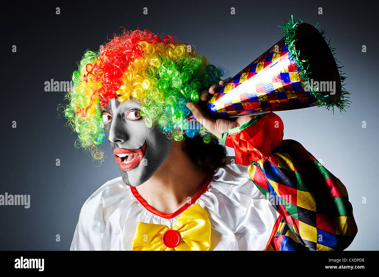 Funny clown in studio shooting Stock Photo - Alamy