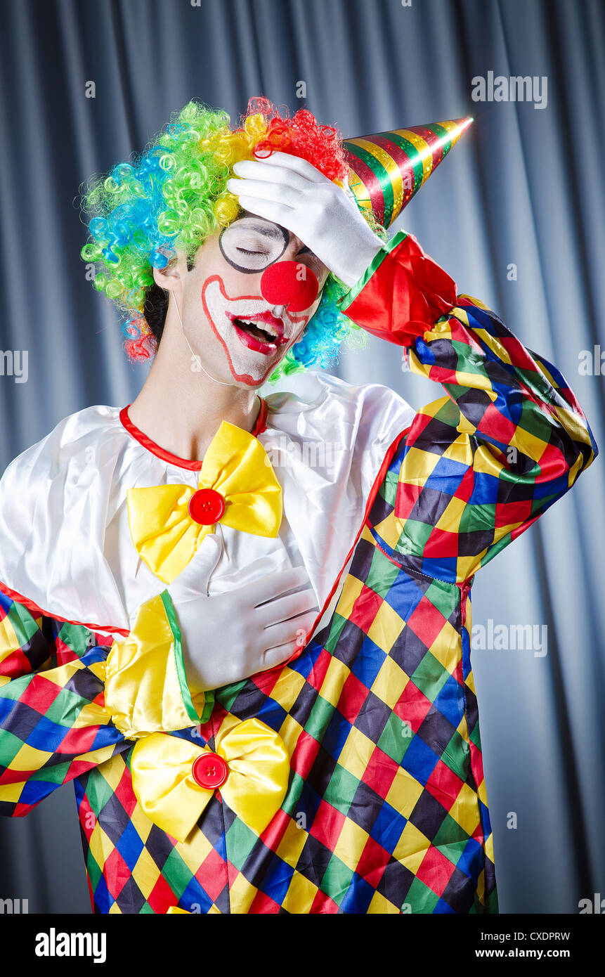 Funny clown in studio shooting Stock Photo - Alamy