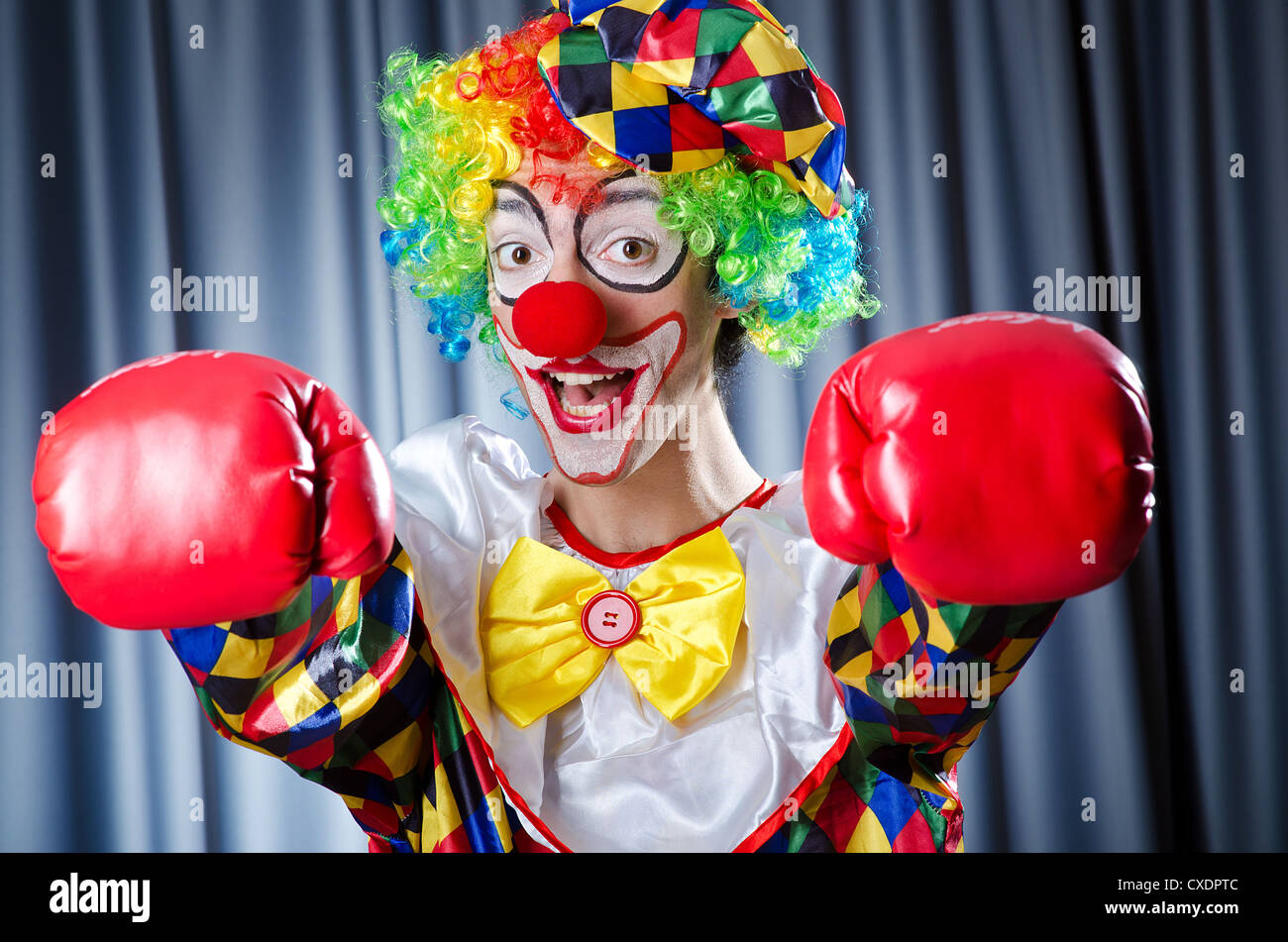 Clown with boxing gloves Stock Photo - Alamy